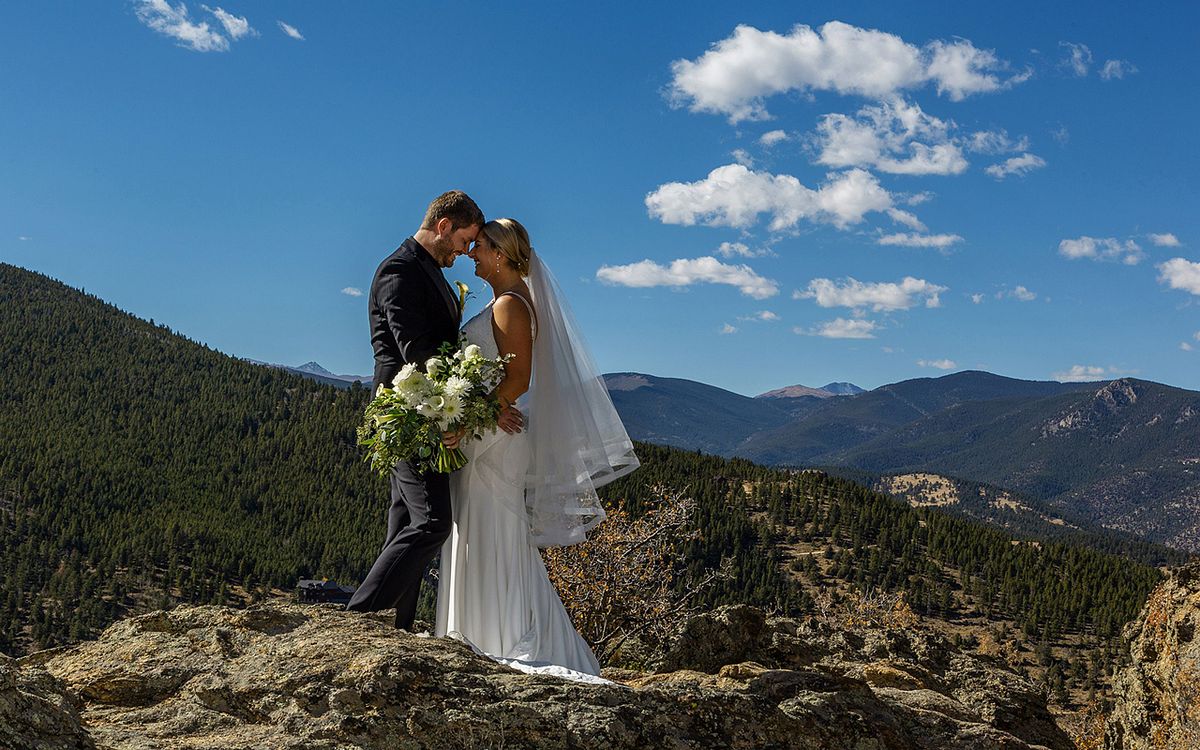 Fall wedding on top of a mountain at North Star Gatherings in Idaho Springs, CO.